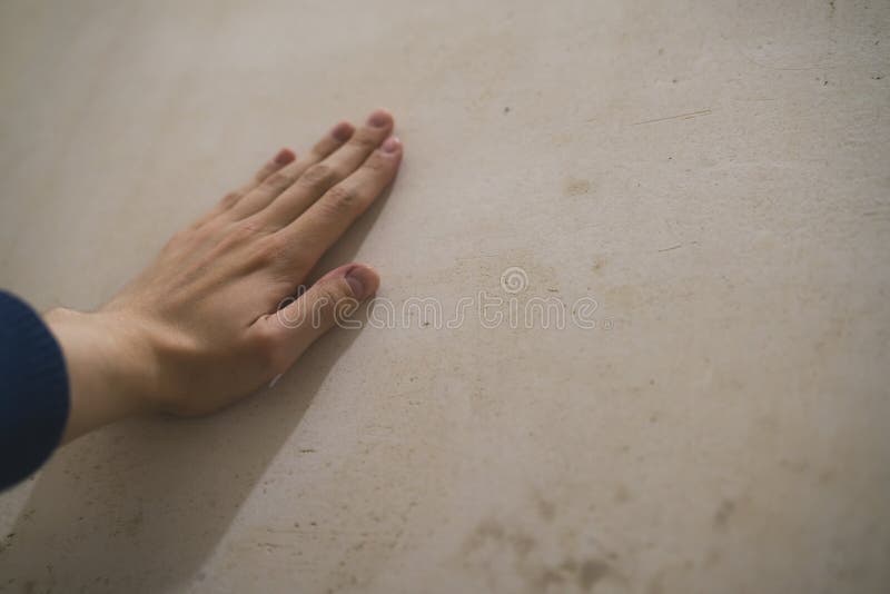 Closeup Young Man Hand Touching Plastered Wall Stock Photo - Image of ...