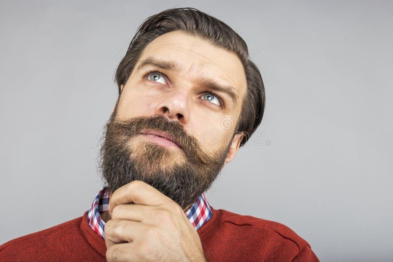 Closeup Of Young Man Thinking Hard Stock Photo - Image of frowning ...