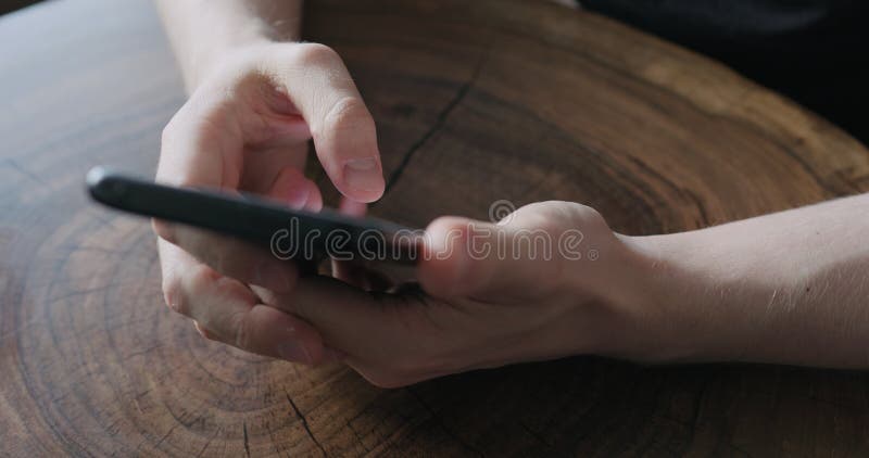 Closeup Young Man Use Smartphone while Sitting at the Table Stock Image ...