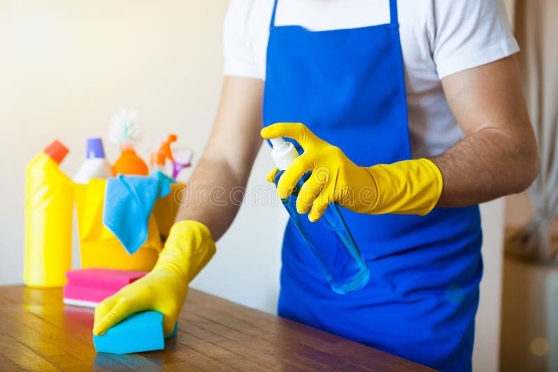 Closeup of Young Man Wearing Apron Cleaning Kitchen Worktop Stock Photo ...
