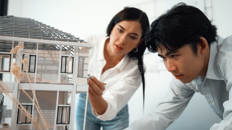 Smart Engineer Team Focusing on Checking the House Model Structure ...