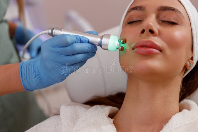 Closeup Of Young Woman Getting Aesthetic Skin Treatment In Beauty Spa