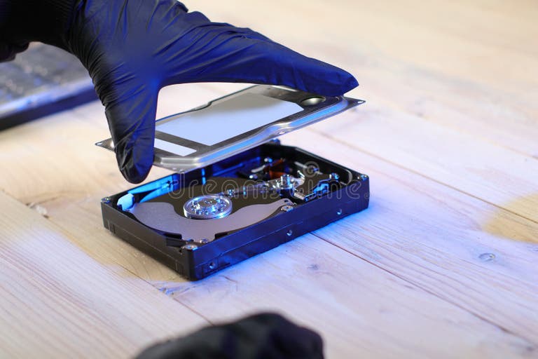 Closing a Computer Disk on a Table by a Person Stock Photo - Image of ...