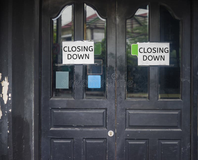 Closing Down Sign Painted on the Window of a Dress Shop Stock Photo ...
