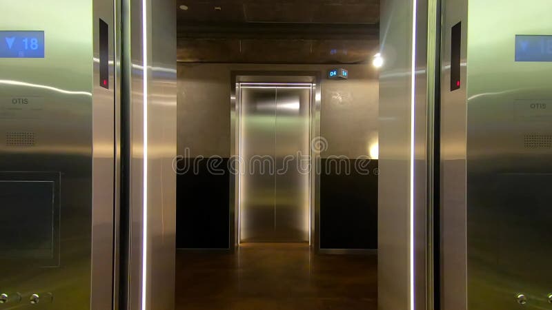 Closing elevator doors i stock video. Video of transport - 214336117