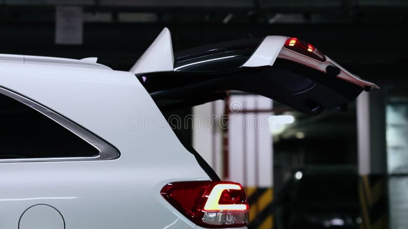 Closing of White Car Boot with Yellow Rear Light Stock Footage - Video ...