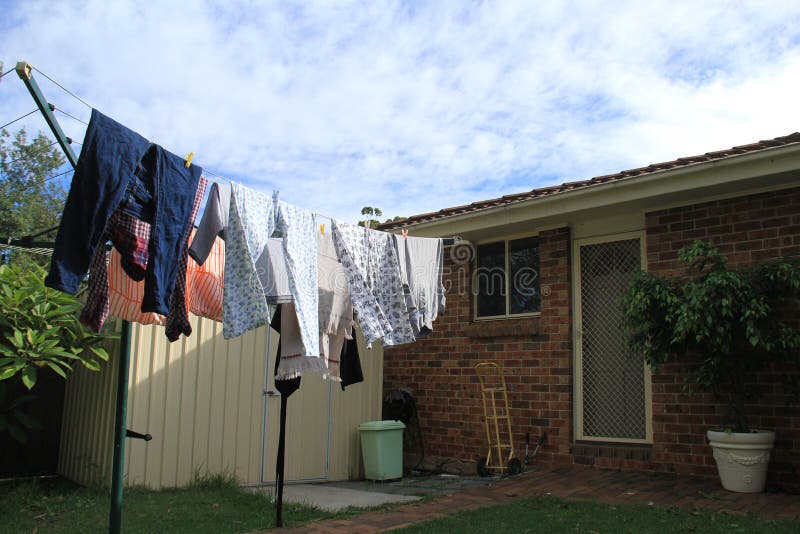 Cloth drying in backyard stock photo. Image of homework - 74901456
