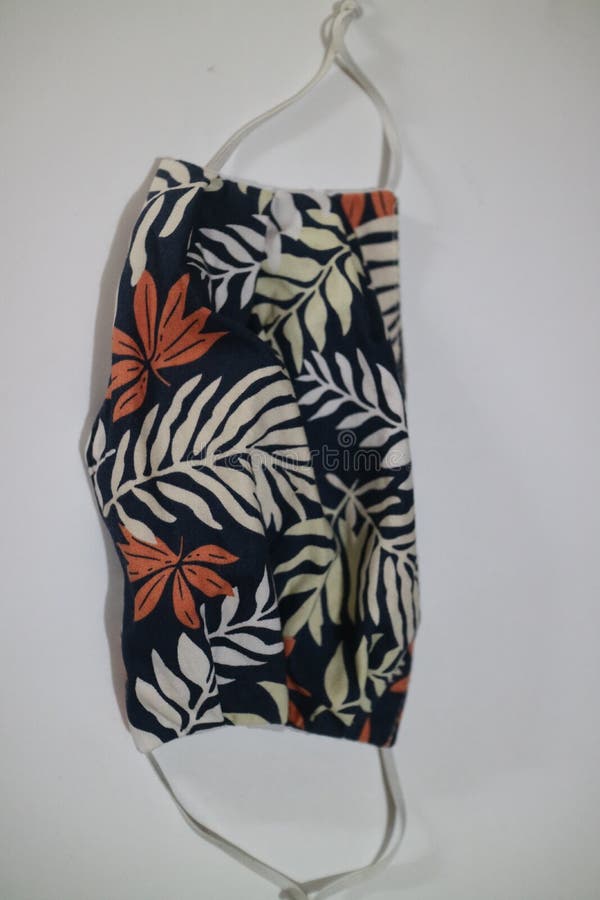 Cloth Mask with Leaf Pattern Stock Photo - Image of fabric, black ...