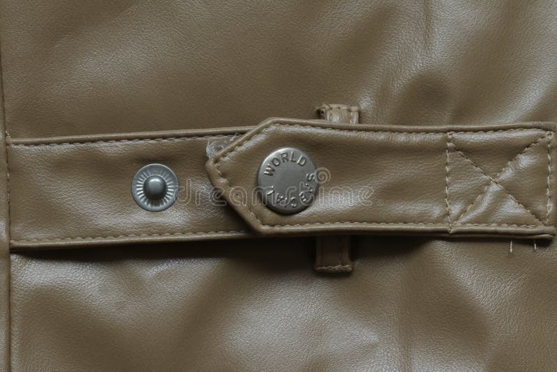 Cloth texture with clasp. stock photo. Image of weapon - 208408134