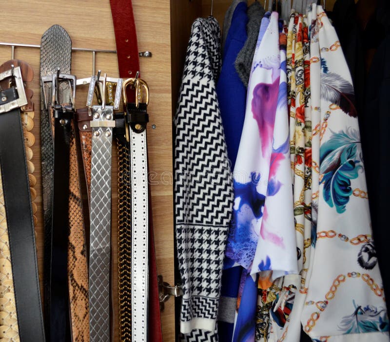 Clothes and Belts in Wardrobe, Close Up. Stock Image - Image of ...