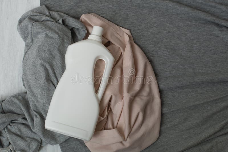 Clothes and Bottle with Detergent. Top View Stock Photo - Image of ...