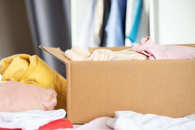 Clothes in a Box for Recycling, Second Hand and Charity, Collection of ...