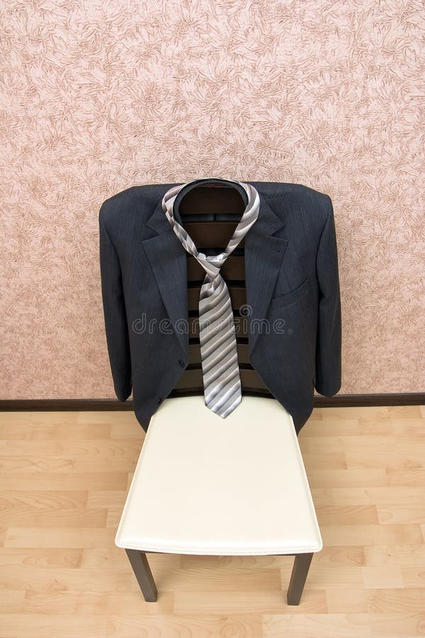 Clothes on the chair stock photo. Image of material, empty - 12717420
