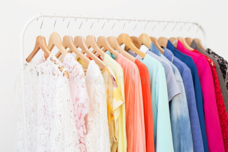Clothes in the Closet Hanging on Hangers Stock Photo - Image of ...