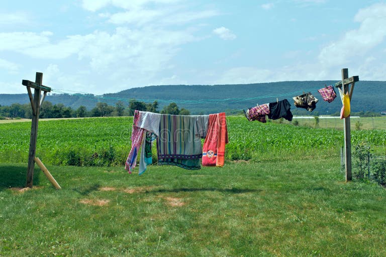 Clothes on a clothesline. stock photo. Image of drying - 14928574
