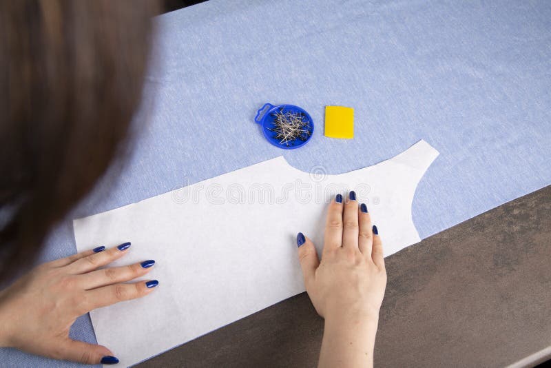 Clothes Designing. Redrawing the Template on the Material Stock Image ...