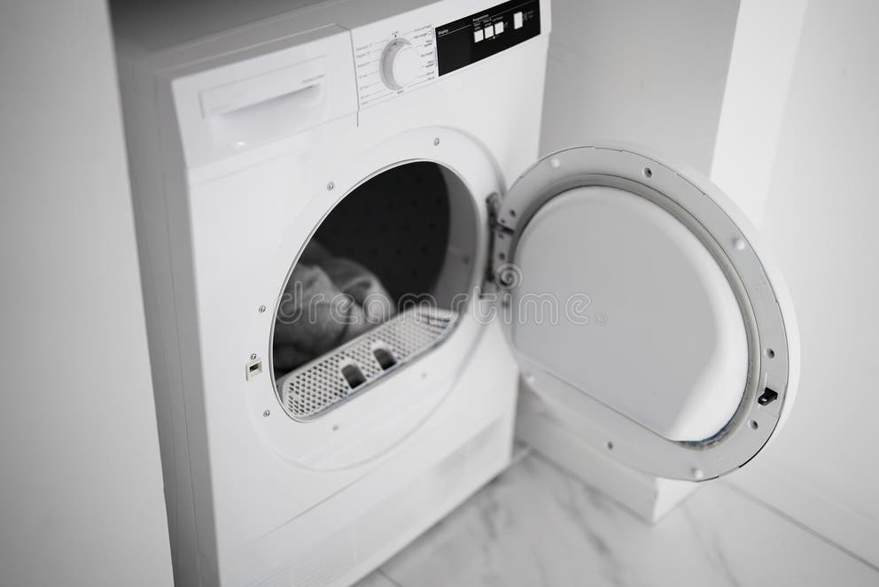 Clothes dryer machine stock image. Image of appliance - 365385339