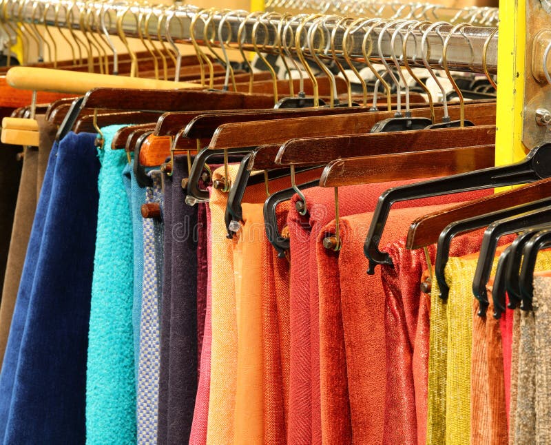 Clothes and Fabrics Arranged on a Hanger in a Clothes Shop Stock Photo ...