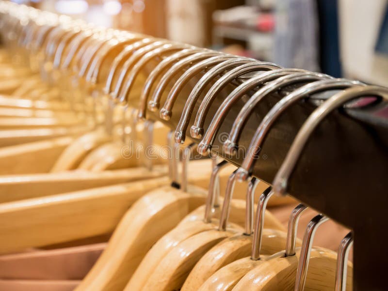 Clothes hang on rack shelf stock image. Image of wear - 77228707