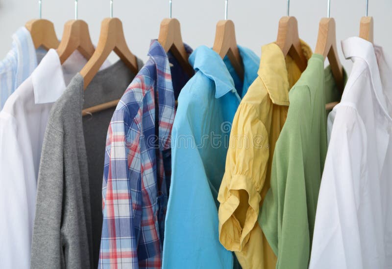 Clothes Hang on a Shelf in Designer Clothes Store Stock Image - Image ...