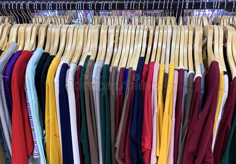 Clothes Hang on a Shelf in a Clothes Store Stock Image - Image of wear ...