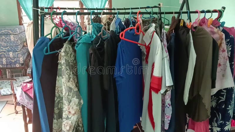 Clothes on Hangers for Drying in a House Stock Footage - Video of ...