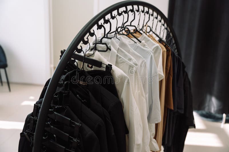 Clothes on Hangers Hang on the Rack in a Clothing Store Stock Image ...