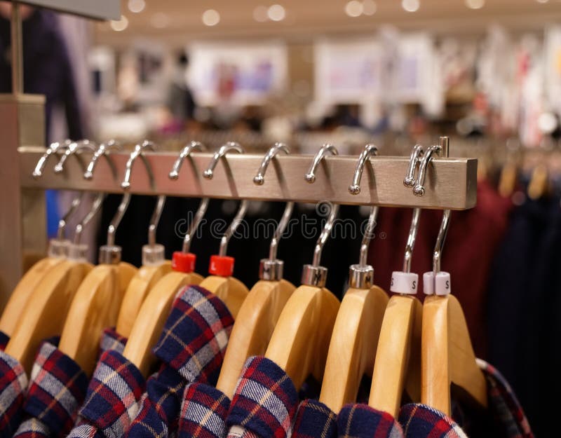 Clothes on Hangers at Shoping Mall. Stock Image - Image of store, dress ...