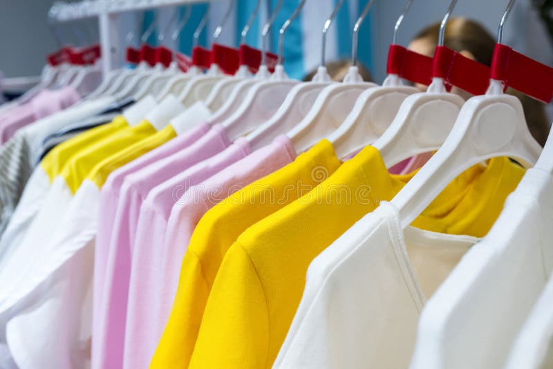 Clothes on Hangers in a Store. Shopping, Shopping, Discounts Stock ...