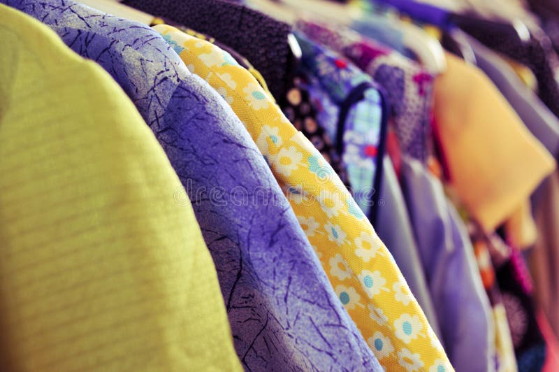 Clothes Hanging on a Rack in a Flea Market Stock Photo - Image of ...