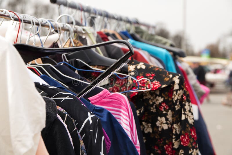 Clothes Hanging on a Rack for Sale at a Flea Market Stock Image - Image ...