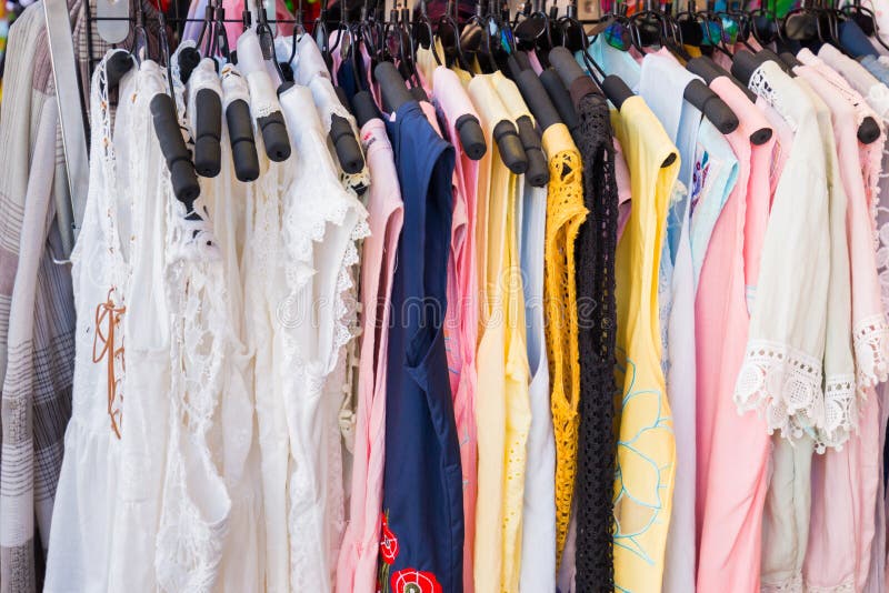 Clothes Hanging on a Rack in a Shopping Mall Stock Photo - Image of ...