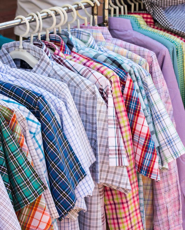 Clothes hanging on a rail stock image. Image of hanger - 62737753