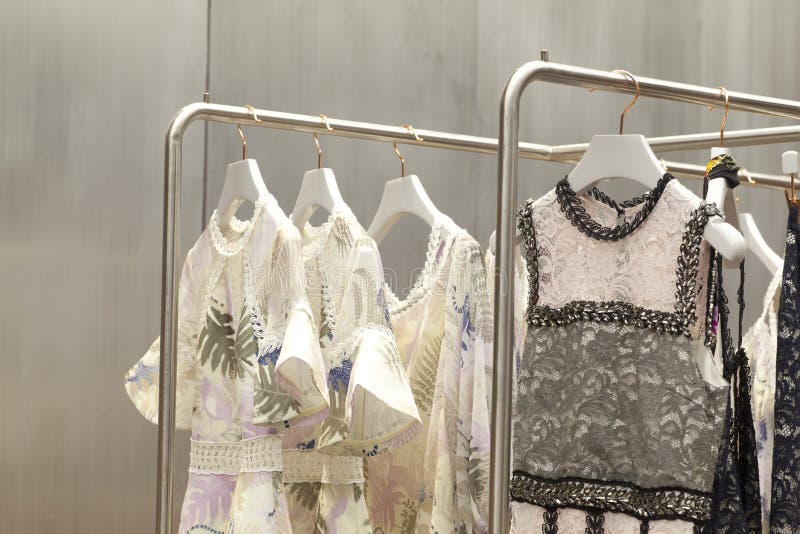 Clothes hanging in store stock photo. Image of choice - 103225580