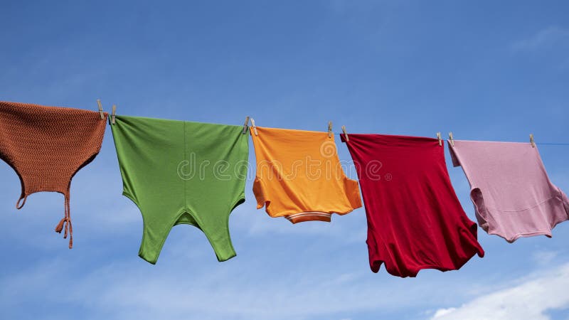 Clothes Hanging To Dry on a Laundry Line Stock Photo - Image of ...