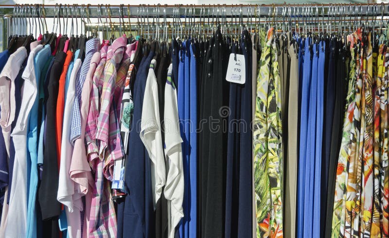 Clothes on a Mobile Clothes Hanger Stock Photo - Image of garments ...