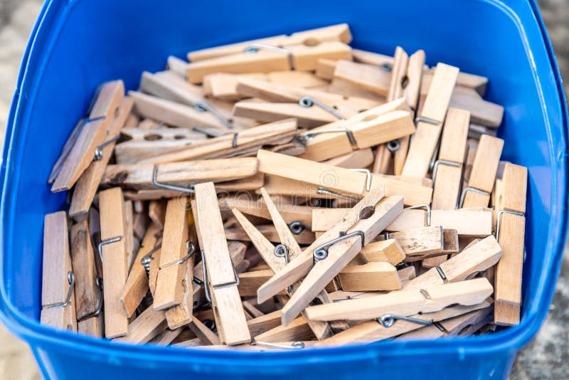 Many wooden clothes pegs stock photo. Image of clothespins - 187829804