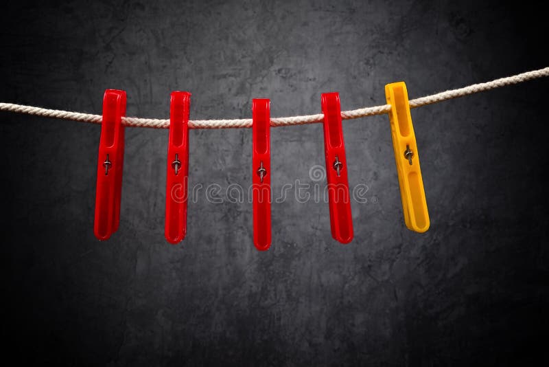 Clothes Pin Standing Out from the Crowd Stock Image - Image of clothes ...