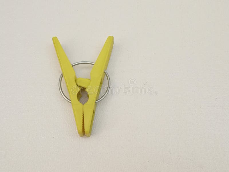 Clothes Pin, a Yellow Color Plastic Laundry Clip or Clothes Peg ...