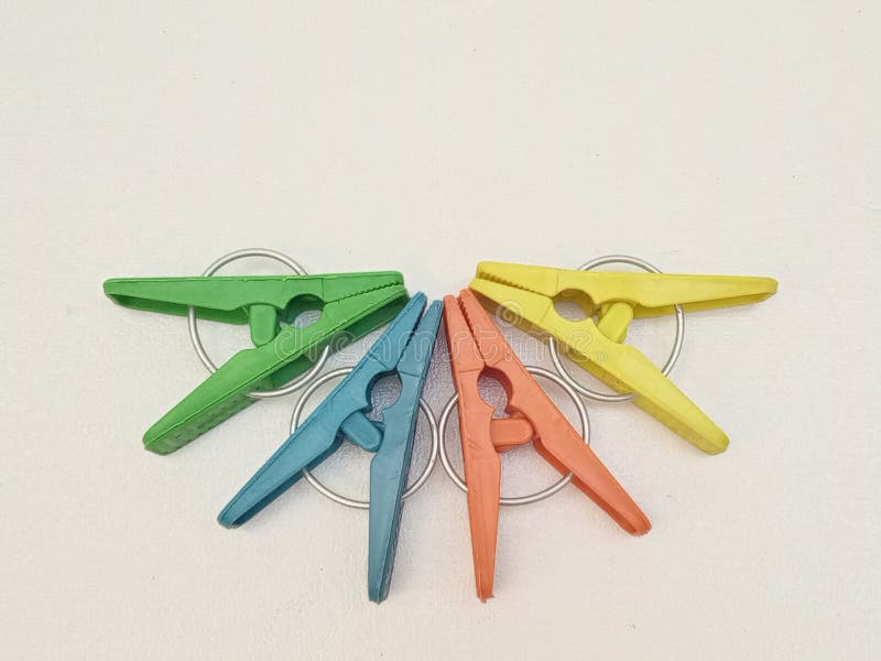 Clothes Pins, Four Multi Color Plastic Laundry Clips or Clothes Pegs ...