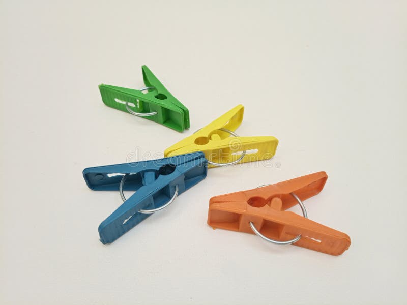 Clothes Pins, Four Multi Color Plastic Laundry Clips or Clothes Pegs ...