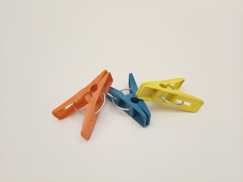 Clothes Pins, Three Multi Color Plastic Laundry Clips or Clothes Pegs ...