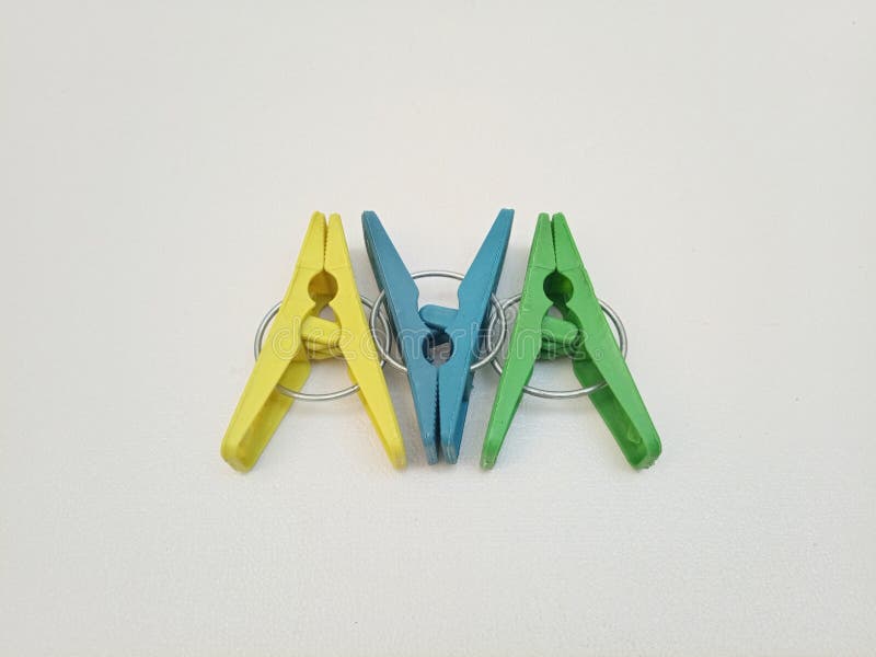 Clothes Pins, Three Multi Color Plastic Laundry Clips or Clothes Pegs ...