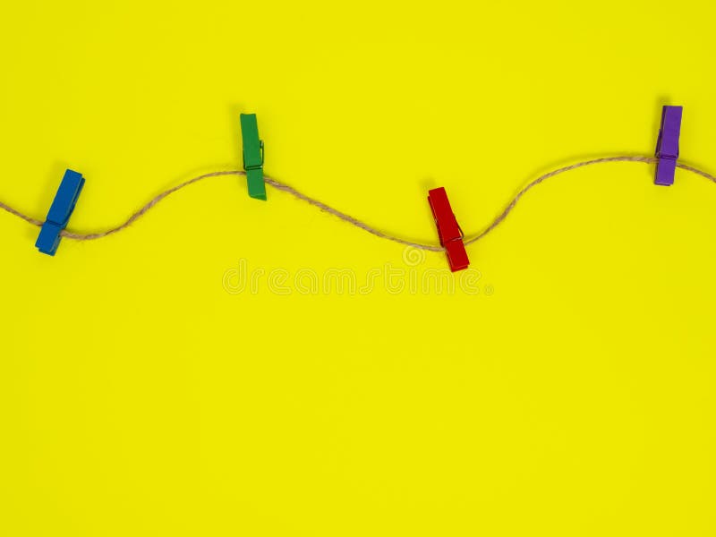 Clothes Pins Wooden on Yellow Background Decorative Stock Image - Image ...