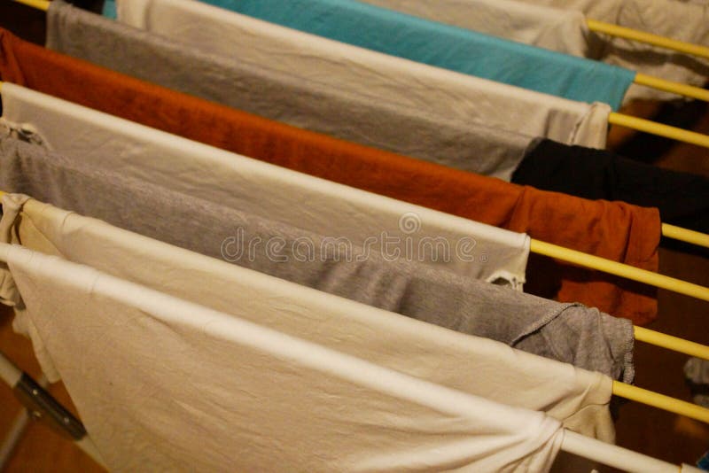 Clothes Rack with Freshly Washed Clothes. Stock Image - Image of bright ...