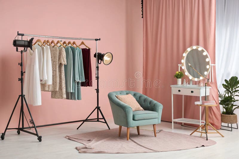 Clothes on Rack and Makeup Table in Studio Setting Stock Illustration ...