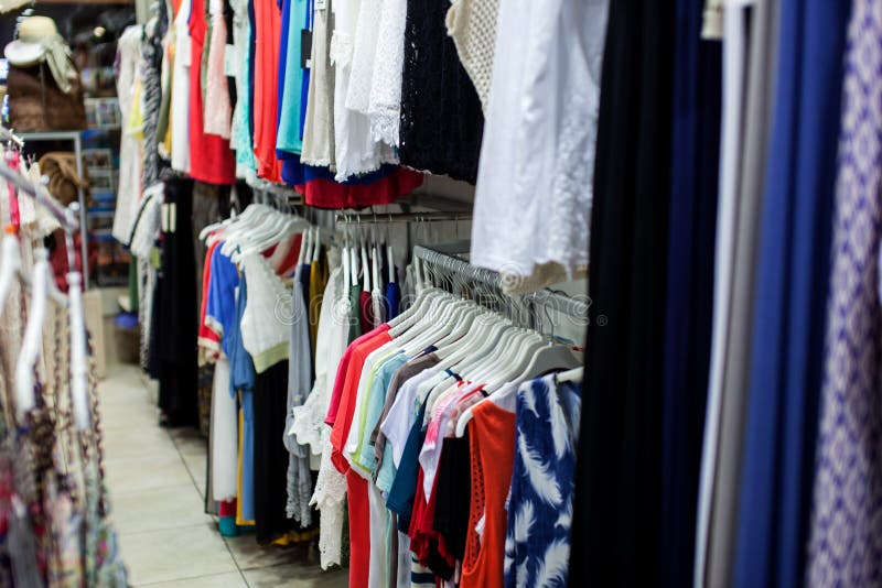 Clothes on Rail in Clothing Store Stock Photo - Image of market ...