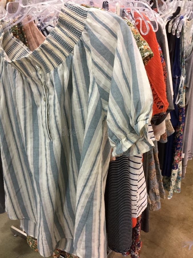 Clothes for sale at store stock photo. Image of sale - 92845434