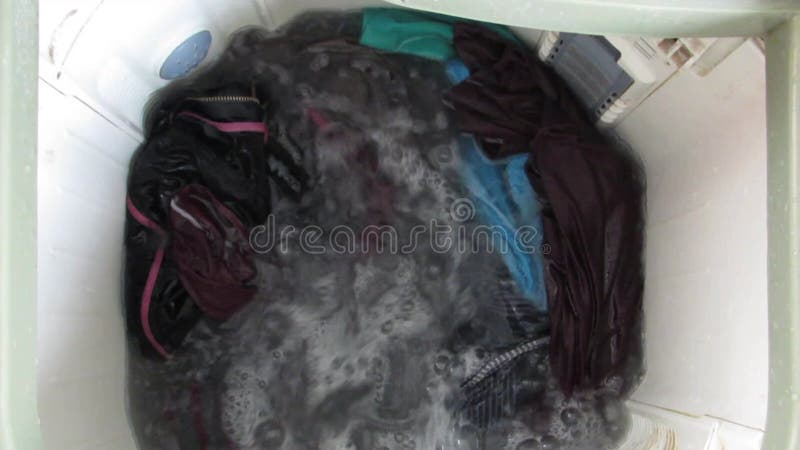 Clothes Spinning in the Washing Machine. Stock Video - Video of ...