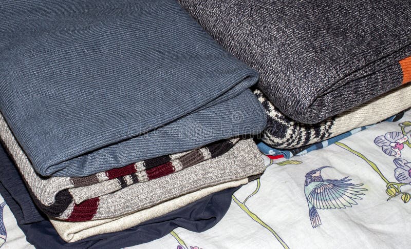 The Clothes are Stacked Neatly in a Pile.Neatly Folded Things.the ...